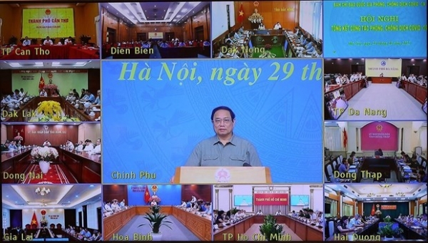PM Pham Minh Chinh chairs national conference reviewing COVID-19 ...