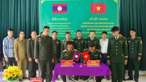 Vietnamese, Lao border forces enhance solidarity to build a borderline ...